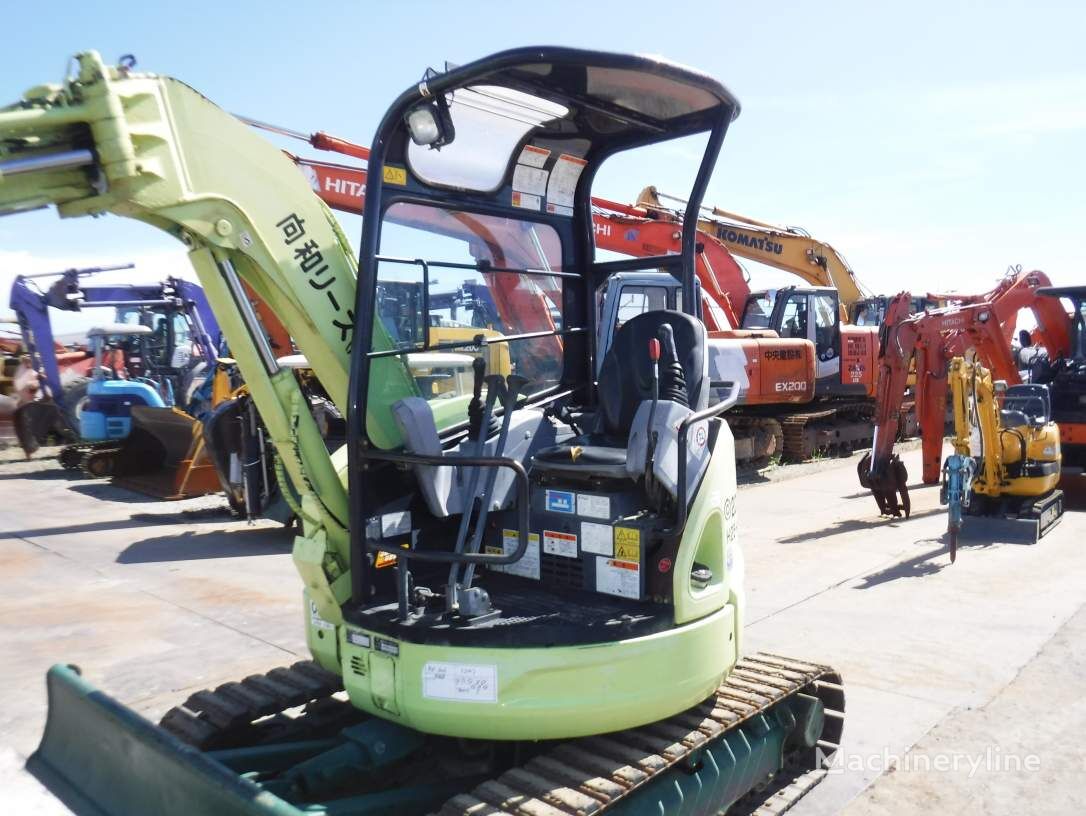 Kubota RX306 bager guseničar