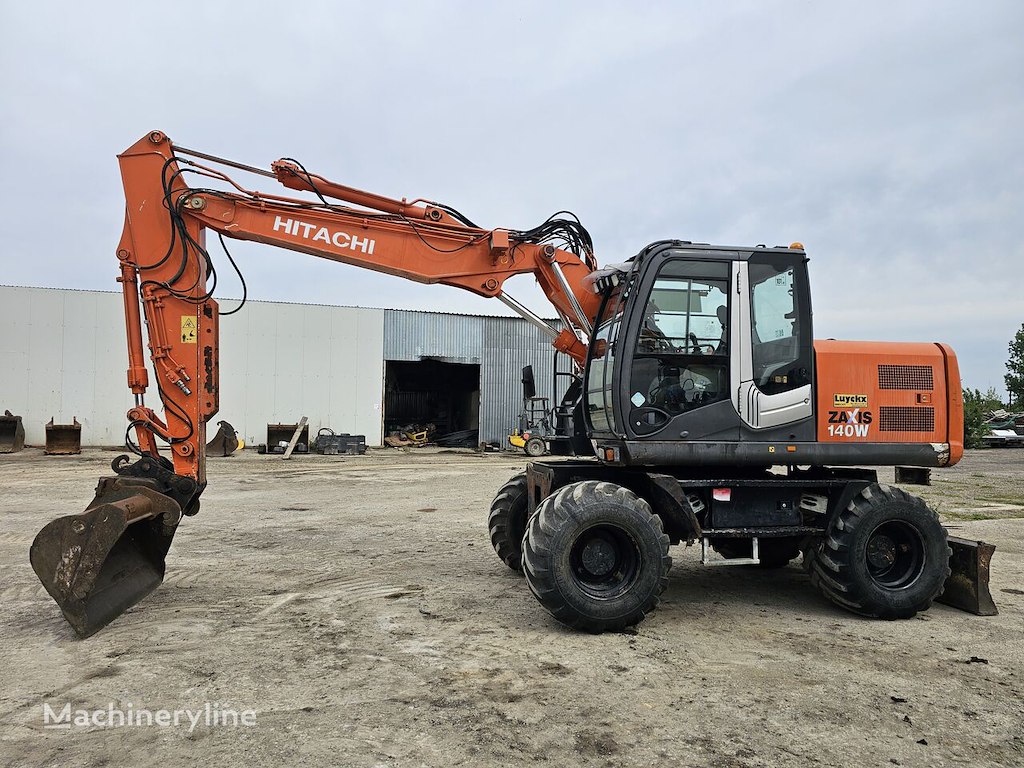 Hitachi ZX140W -3 with blade bager točkaš