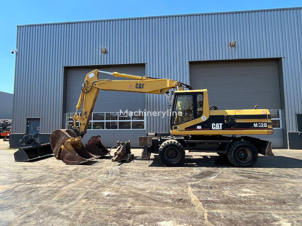 Caterpillar M320 complete with 4 buckets and hammer available bager točkaš