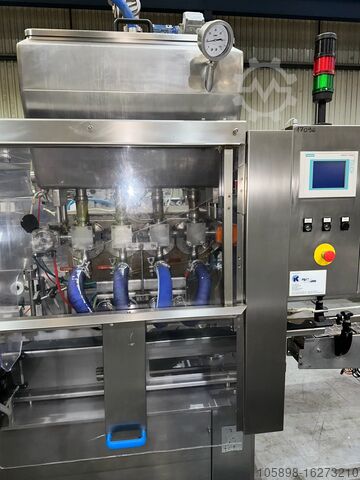 Filer za tegle od 6 glavice i umetnuti parni kaper.
Filling Systems Jar filler and steam capper