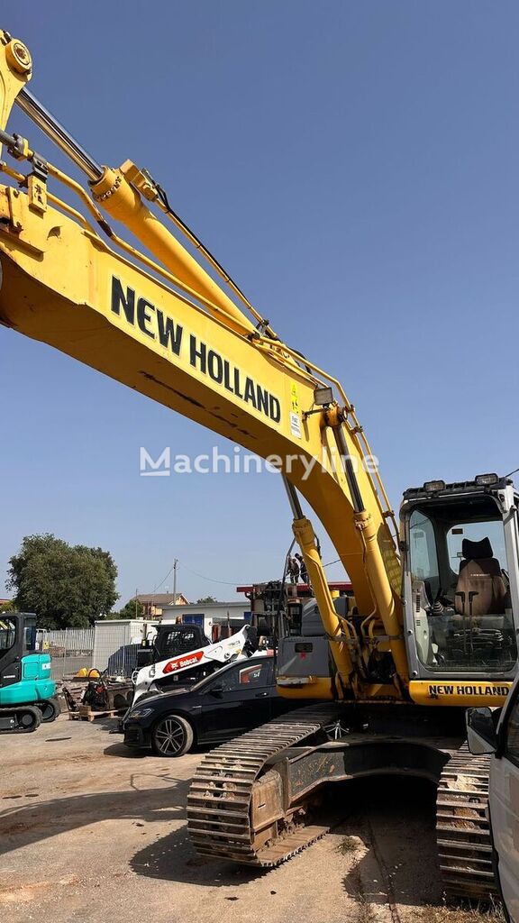 New Holland E245B bager guseničar