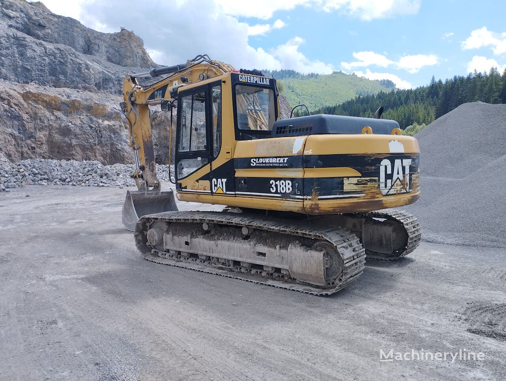 Caterpillar 318 B L bager guseničar