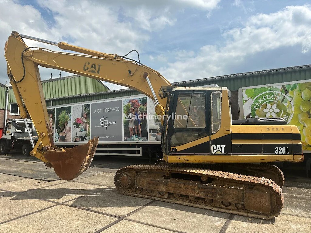 Caterpillar 320 L bager guseničar