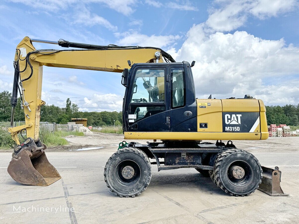 Caterpillar M315D bager točkaš