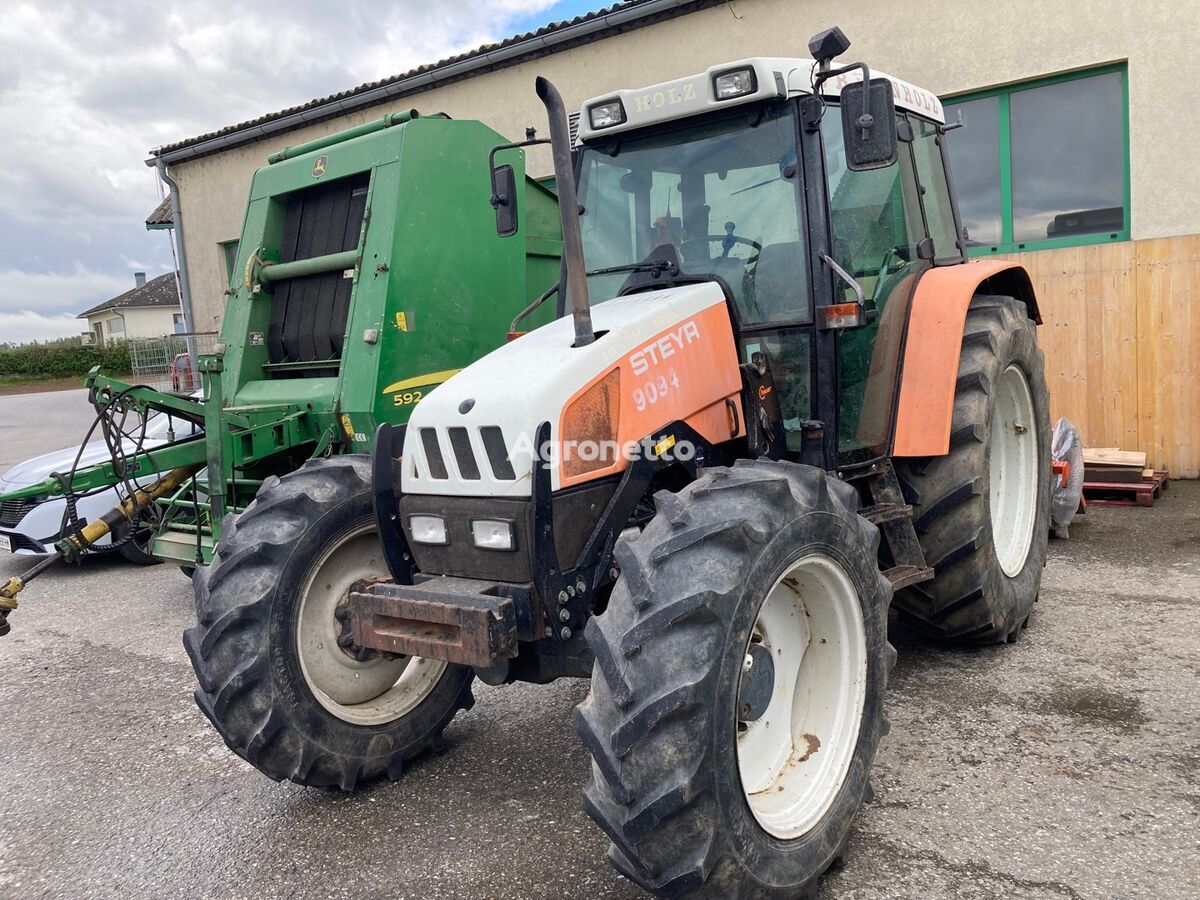 Steyr 9094 mit Hauer POM-R90 traktor točkaš