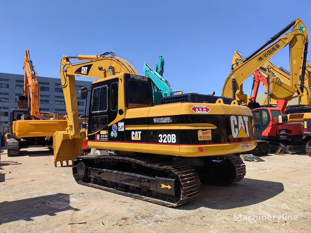 Caterpillar 320BL bager guseničar