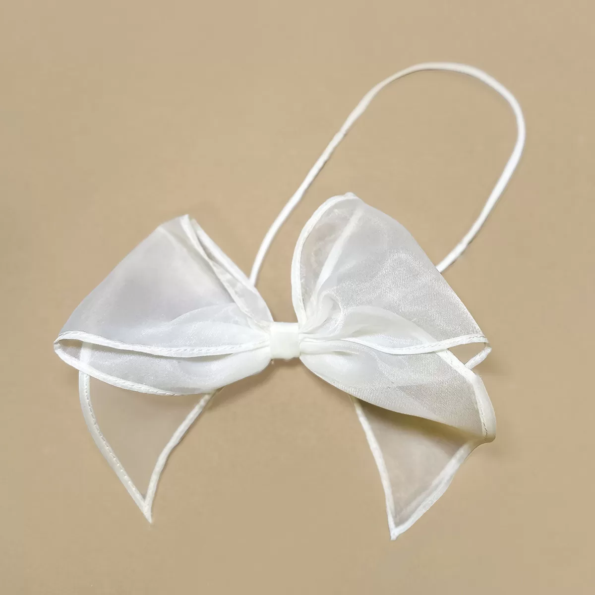 TRAKA BOW WHITE