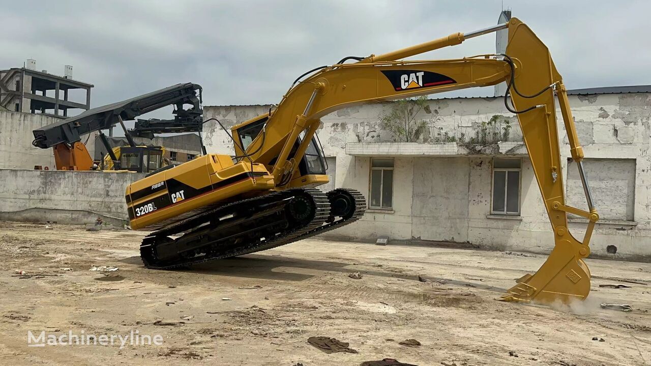 Caterpillar 320BL bager guseničar