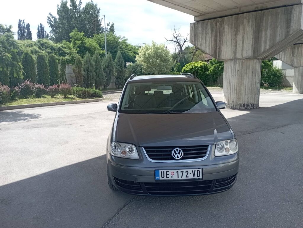 Volkswagen Touran: 1.9 l | 2006 г. Limuzina
