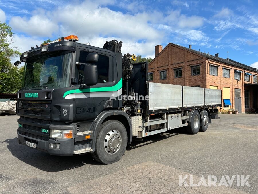 Prodaje se Scania 340 / 114L kamion s ravnom platformom na aukciji
