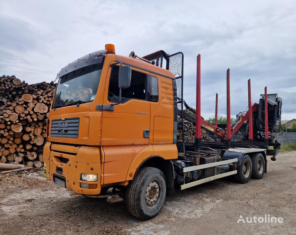 MAN TGA 33.530 + timber trailer kamion za prevoz drva