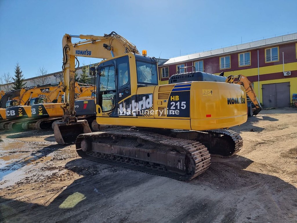 Komatsu HB215 bager guseničar