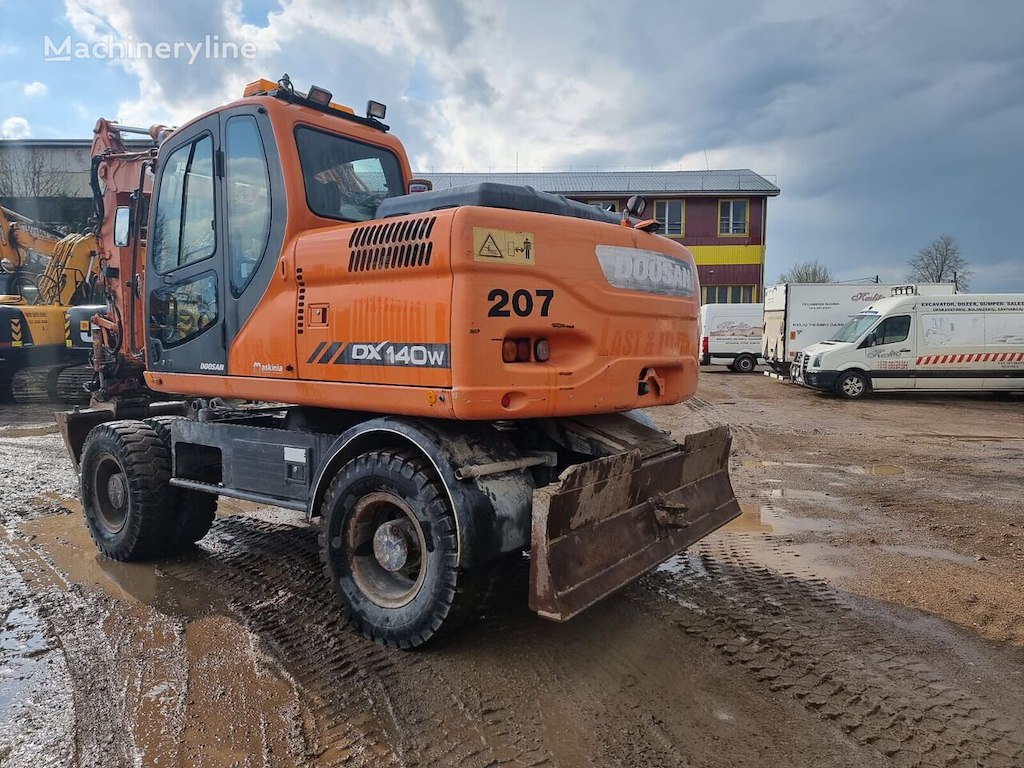 Doosan DX 140W ROTOTILT bager točkaš