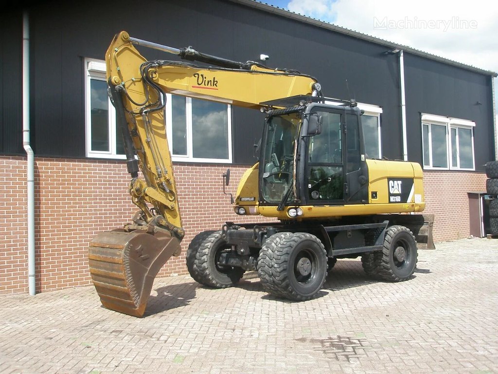 Caterpillar M316D bager točkaš