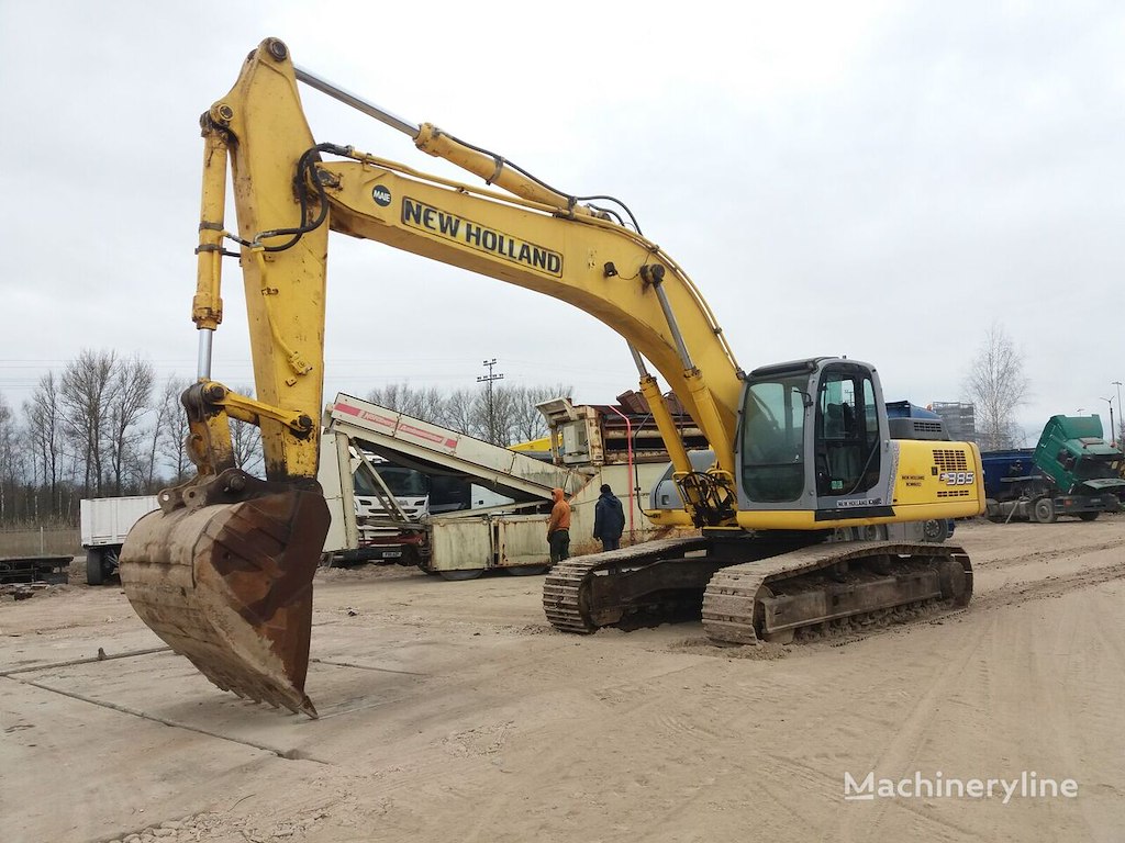 New Holland E385 bager guseničar