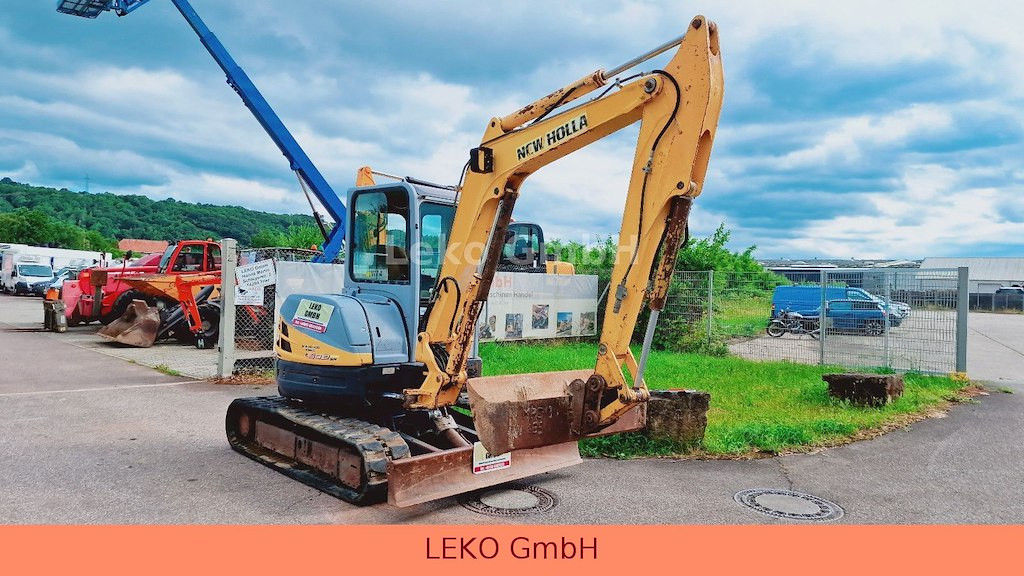 New Holland Kobelco F.502 SR Mit Drei Löffeln mini bager