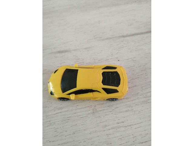 Kinder figurica - Automobil žuti DV255