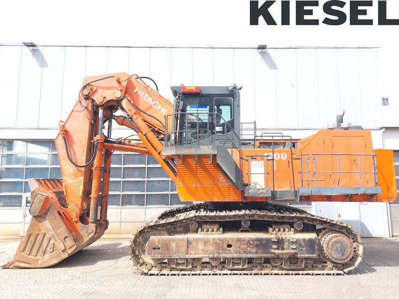 Hitachi EX1200-6 bager guseničar