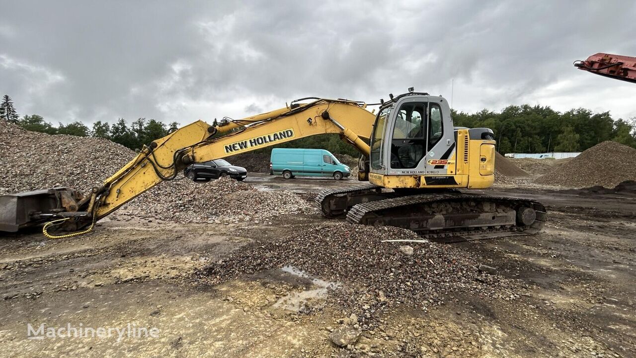 New Holland Kobelco E235 BSR-2 bager guseničar