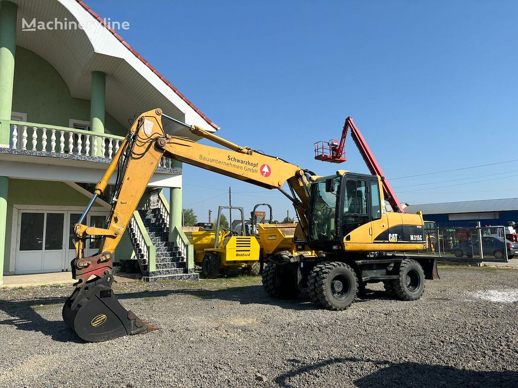 Caterpillar M315C bager točkaš