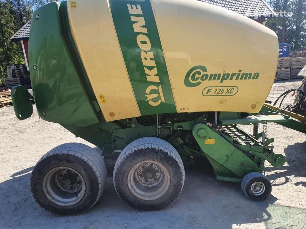 Prodaje se Krone Comprima F125 XC balirku za okrugle bale na aukciji