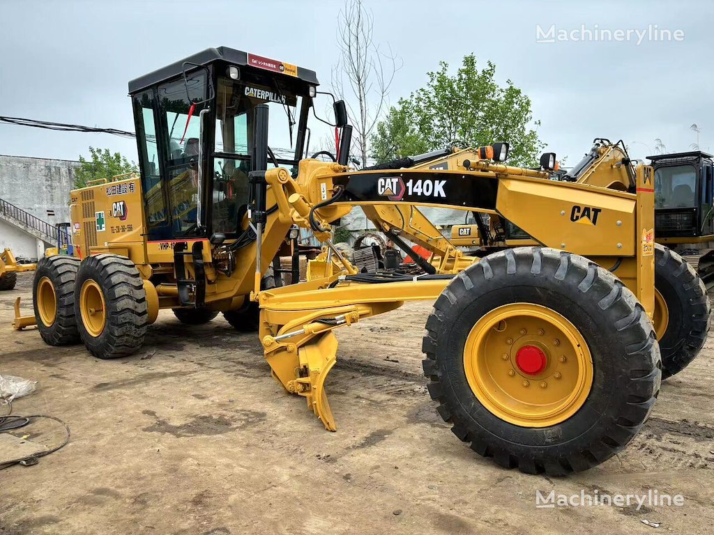 Caterpillar 140K grejder