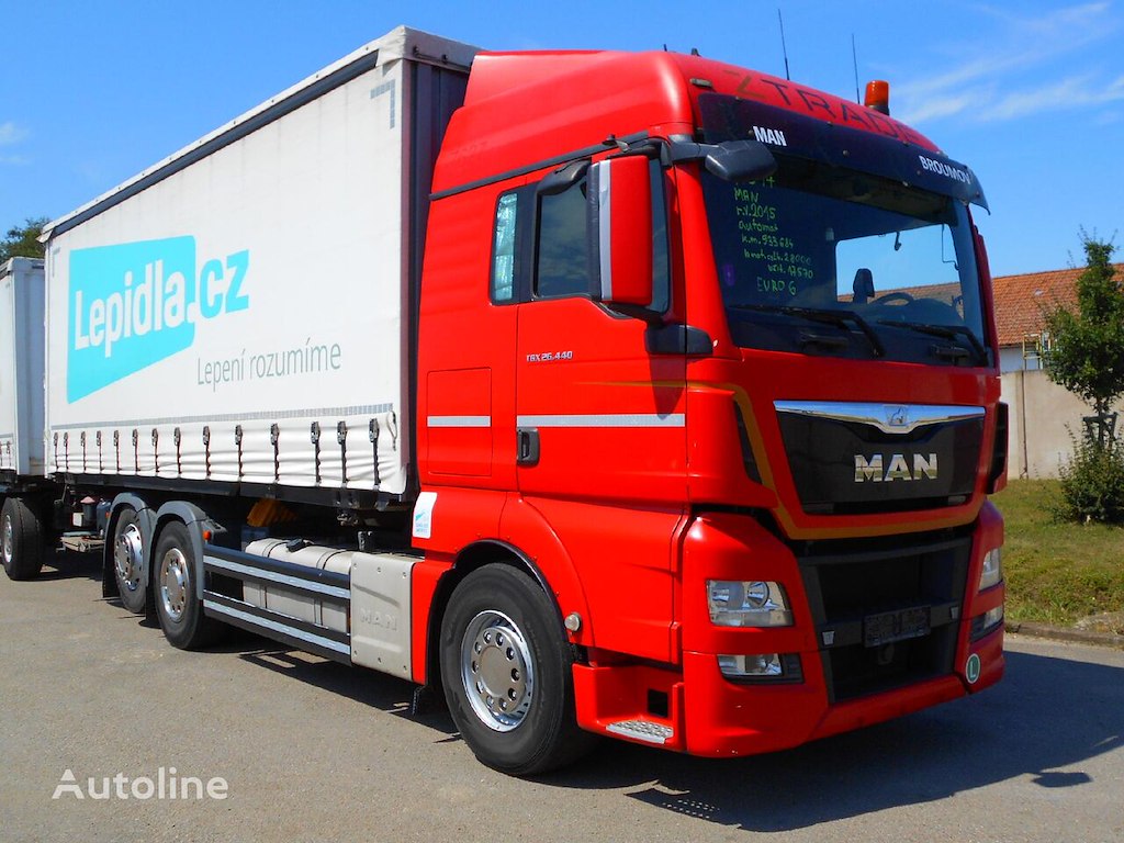 MAN TGX 26.440 kamion s ravnom platformom