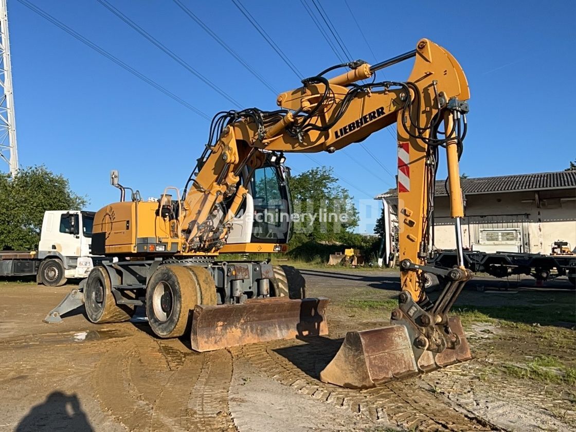 Liebherr A 314 Litronic with VA offset boom bager točkaš