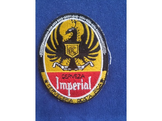 AMBLEM PIVO IMPERIAL - CERVEZA COSTA RICA