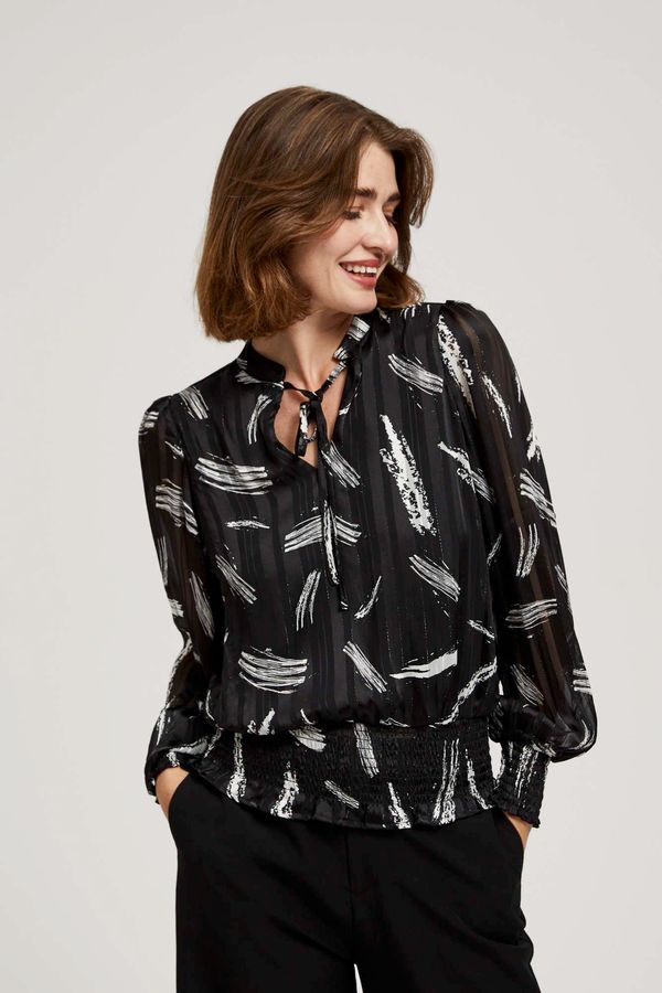 SHIRT WITH A TIED NECKLINE