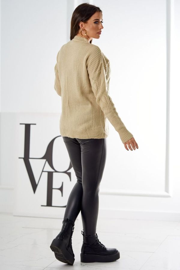 Sweater draped over the head with fashionable beige fabric