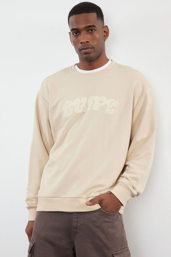 TRENDYOL BEIGE OVERSIZE/WIDE CUT EMBOSSED PRINTED SWEATSHIRT