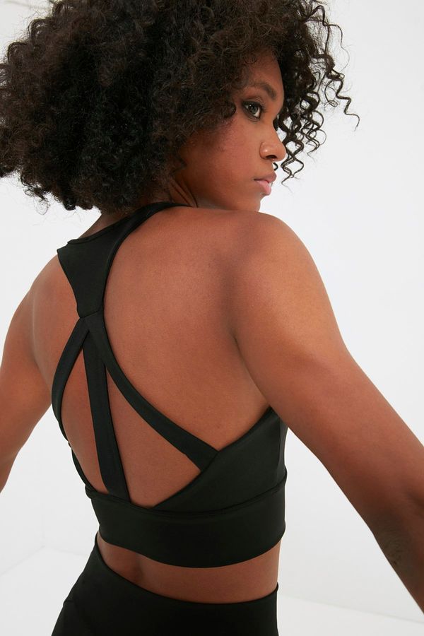 TRENDYOL BLACK SUPPORT/SHAPING BACK DETAIL KNITTED SPORTS BRA