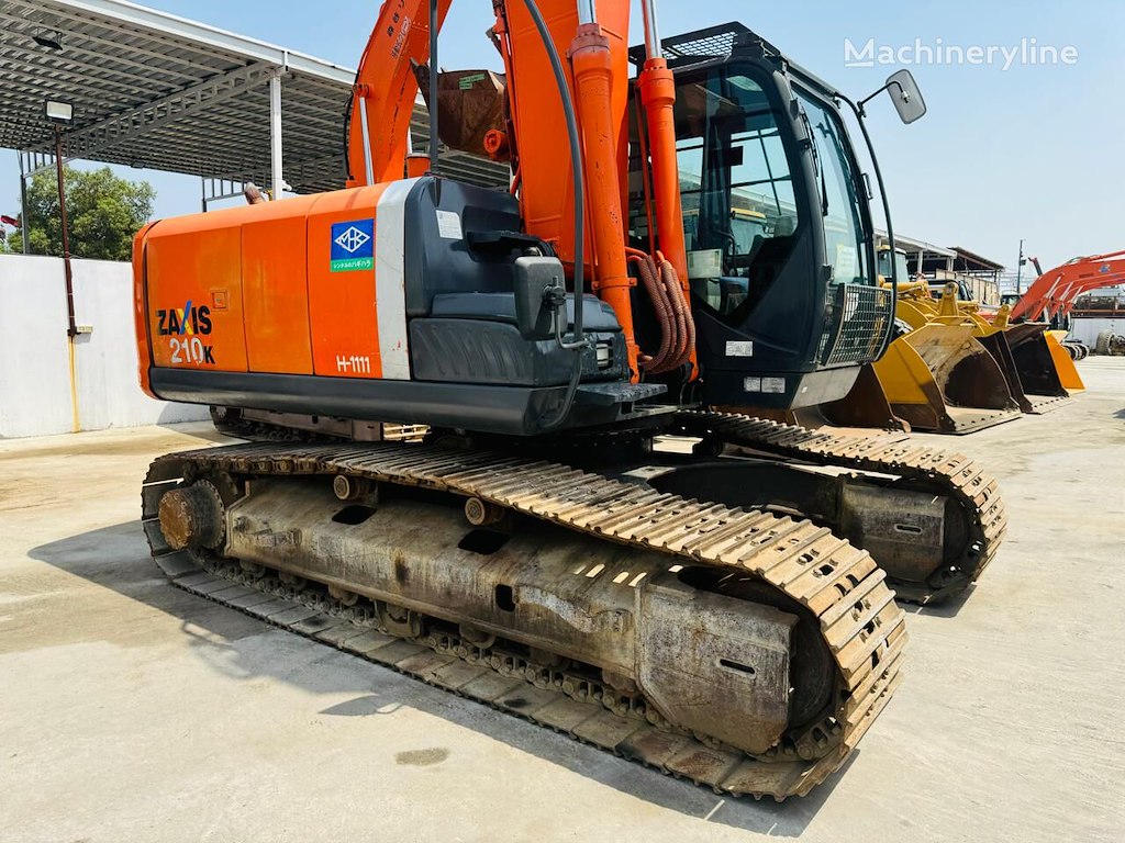 Hitachi ZX210 bager guseničar