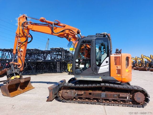 Bager za puzanje
Hitachi ZX 135 US 5-B