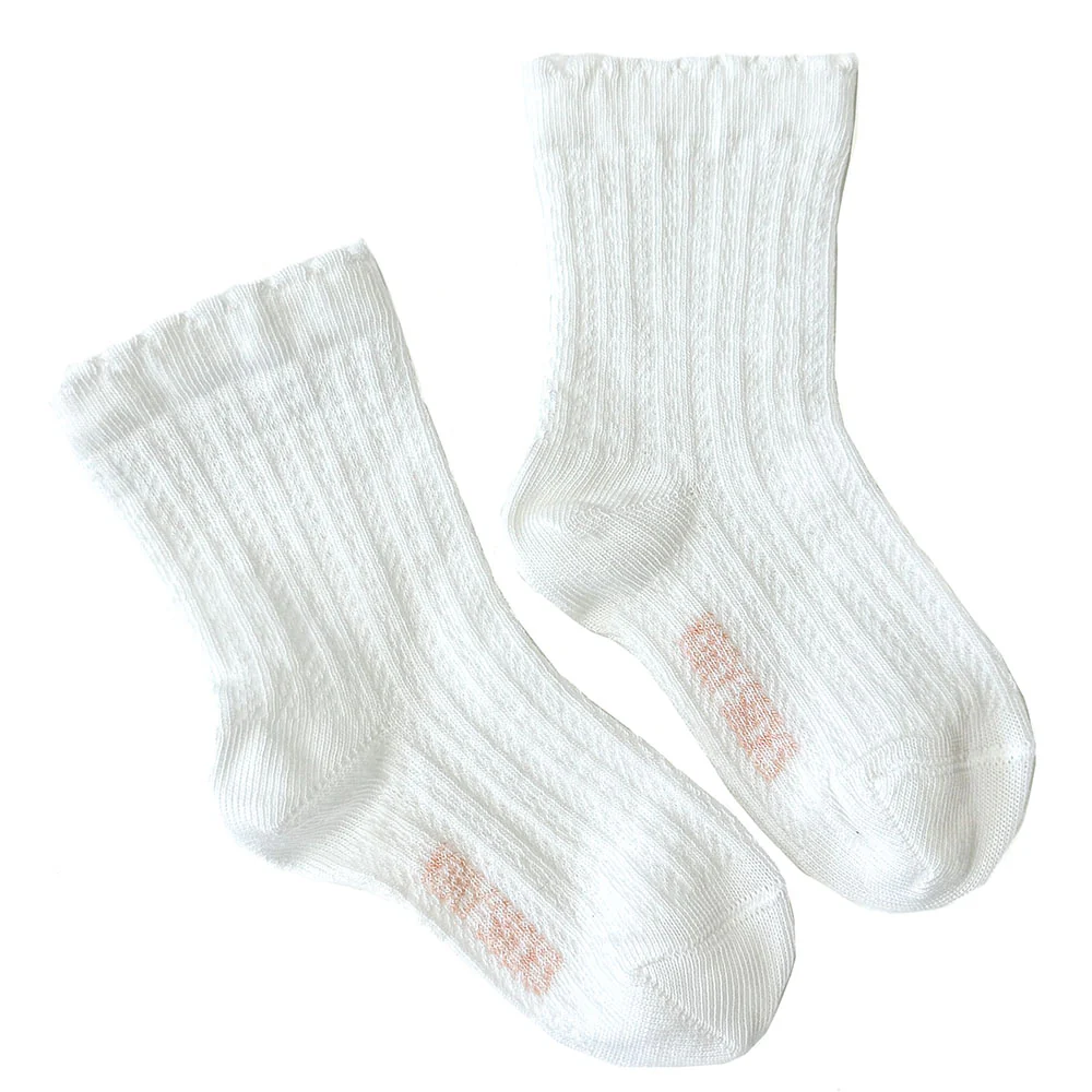 Cream Elegant Ribbed Socks
Cream Elegant Ribbed Socks