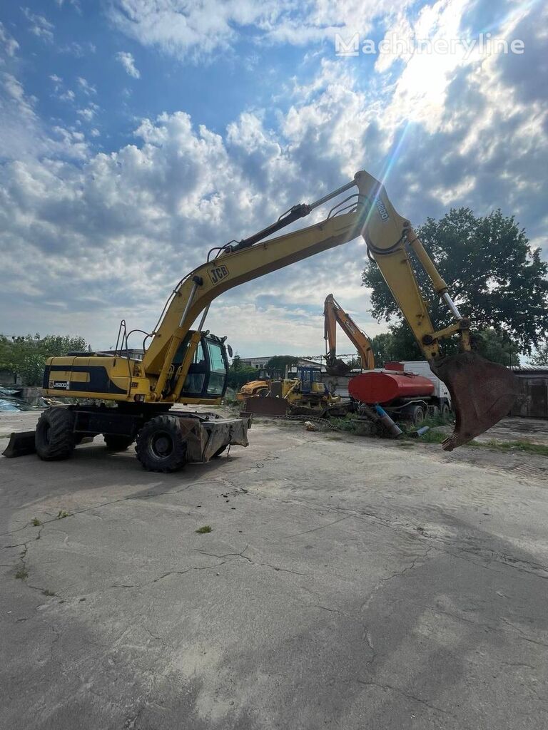 JCB JS 200 W (mozhlyvyi lizynh) bager točkaš