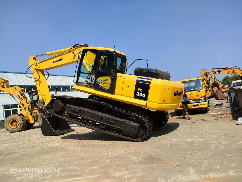 Komatsu PC300 bager guseničar