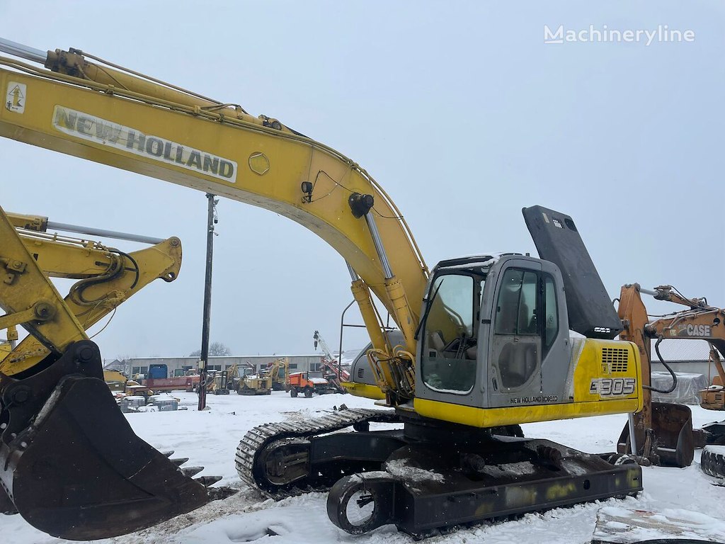 New Holland E 305 bager guseničar po rezervnim delovima