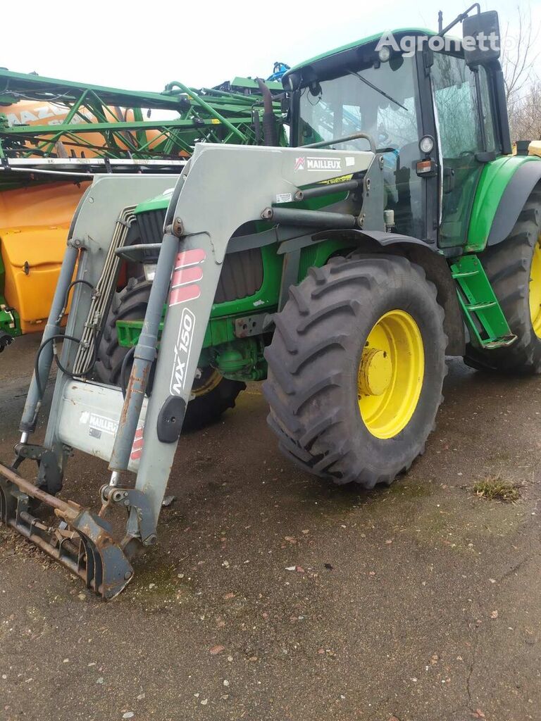 John Deere 6920 + frontalnyi navantazhuvach Mailleux MX 150 v naiavnosti traktor točkaš