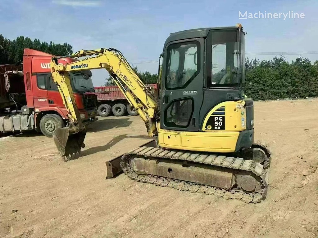 Komatsu PC50 bager guseničar