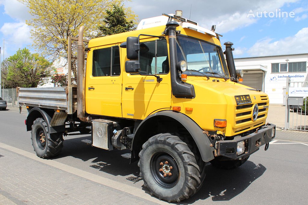 Mercedes-Benz Unimog U 4000 437/25 kamion s ravnom platformom