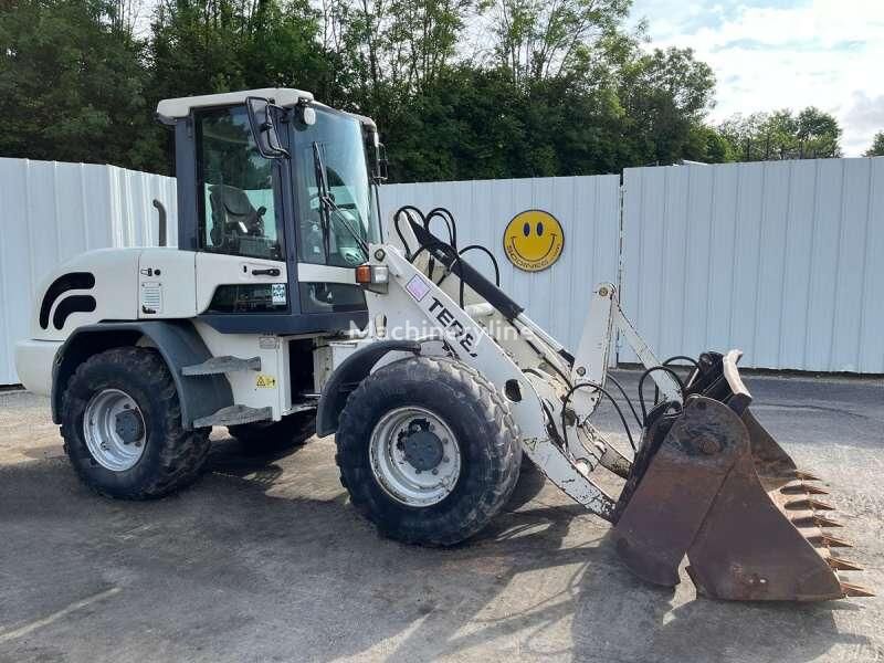 Terex TL100 multifunkcionalni utovarivač