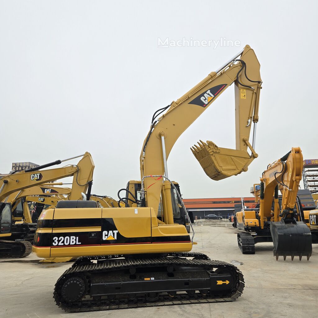 Caterpillar 320BL bager guseničar