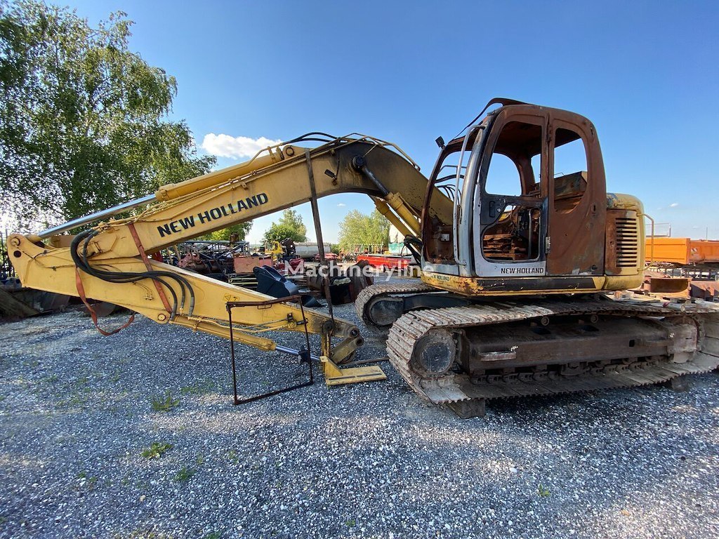 New Holland E135SR bager guseničar po rezervnim delovima