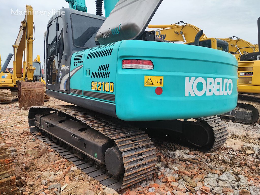 Kobelco SK210 bager guseničar