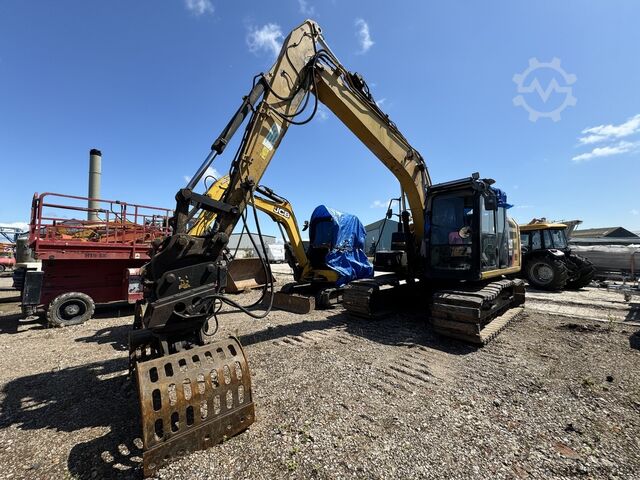 Bager
CATERPILLAR 312E