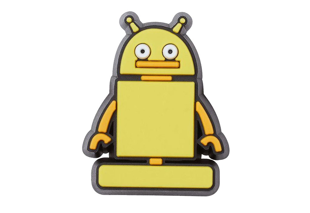 Crocs 
Crocs Jibbitz
- Tiny Yellow Robot