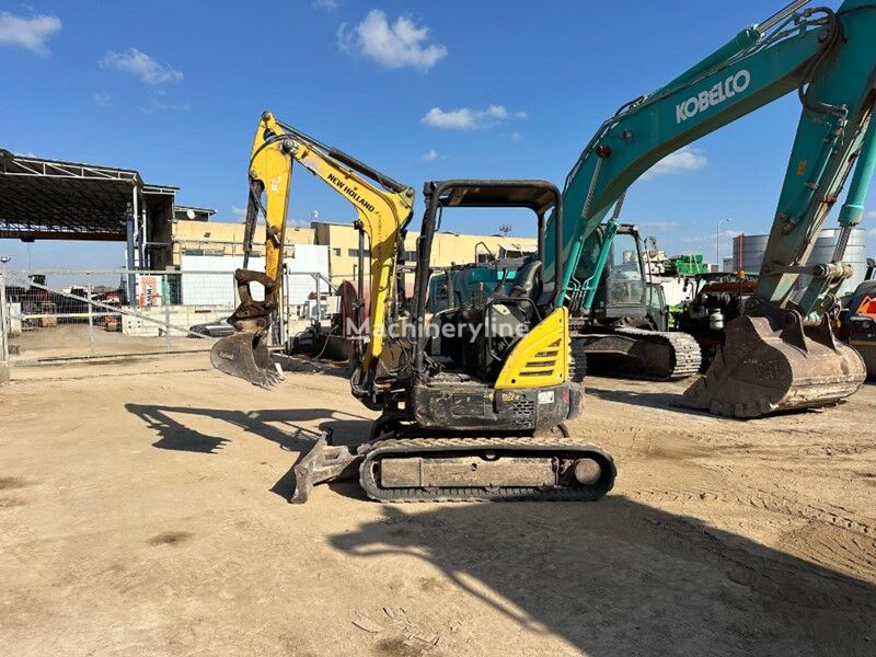 New Holland E26C mini bager