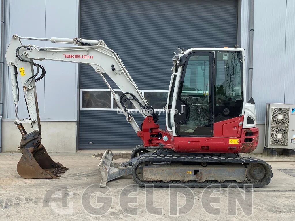 Takeuchi TB260 - 2 buckets mini bager